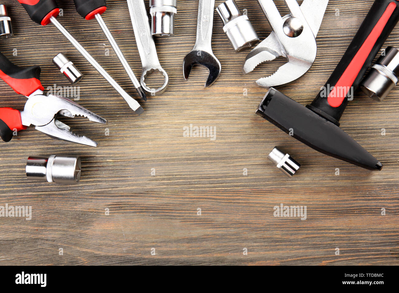 Different kinds of tools on wooden background, top view Stock Photo - Alamy
