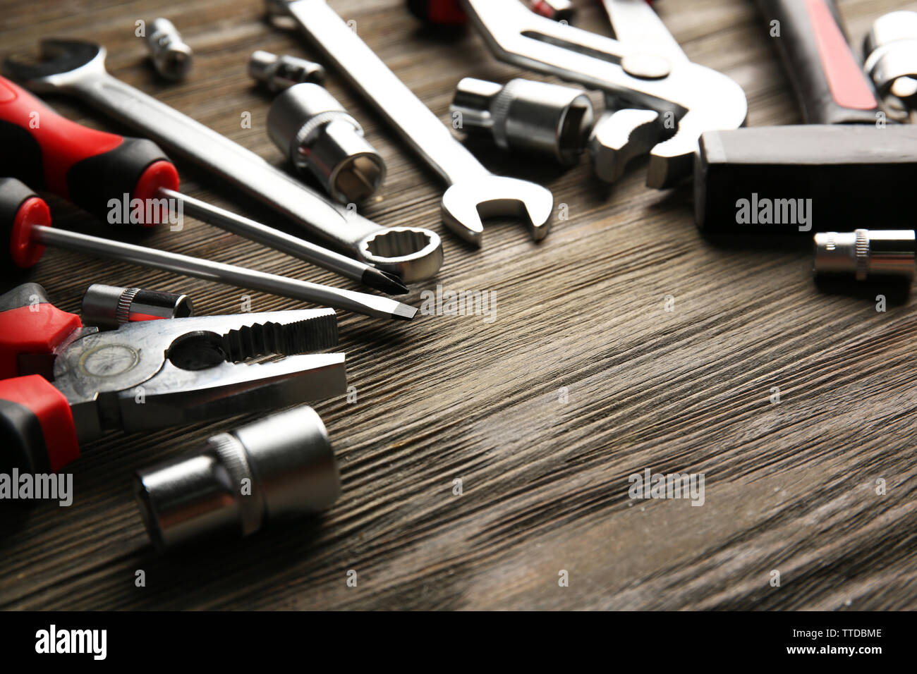 Different kinds of tools on wooden background, top view Stock Photo - Alamy