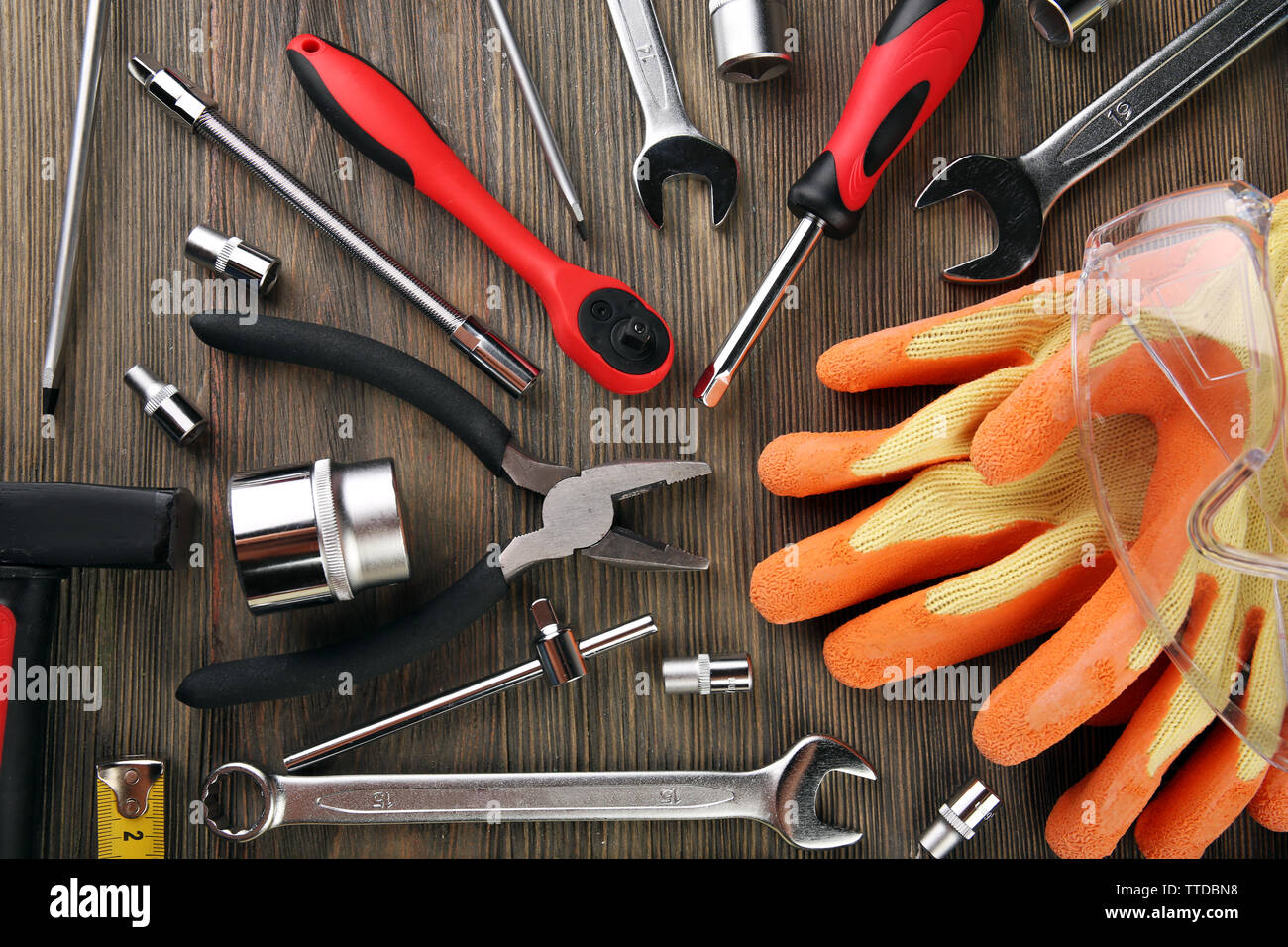 Different kinds of tools on wooden background, top view Stock Photo - Alamy