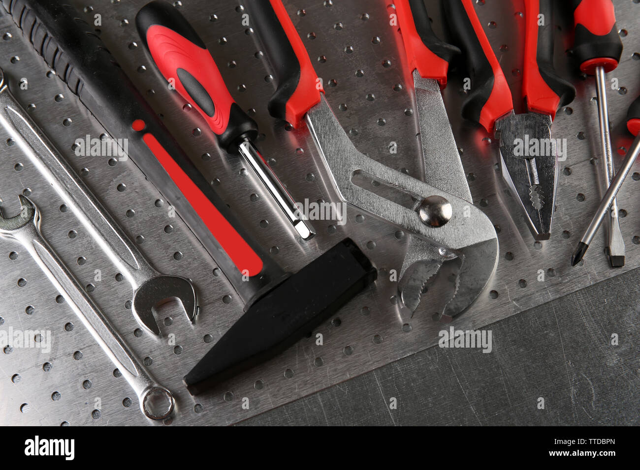 Different kinds of tools on dark background Stock Photo - Alamy