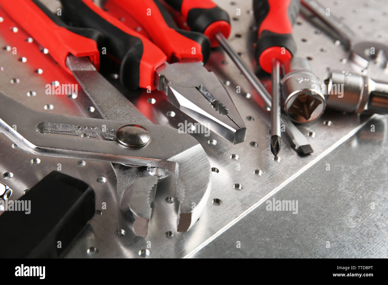 Different kinds of tools on dark background Stock Photo - Alamy