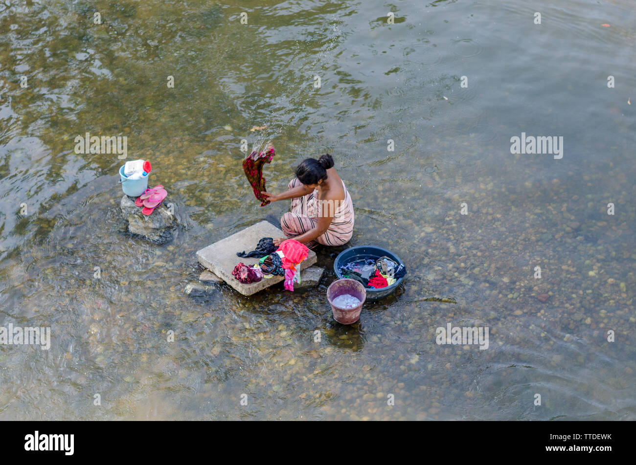 A Woman Doing Laundy in the Holy Water of the Menik Ganga in Kataragama ...