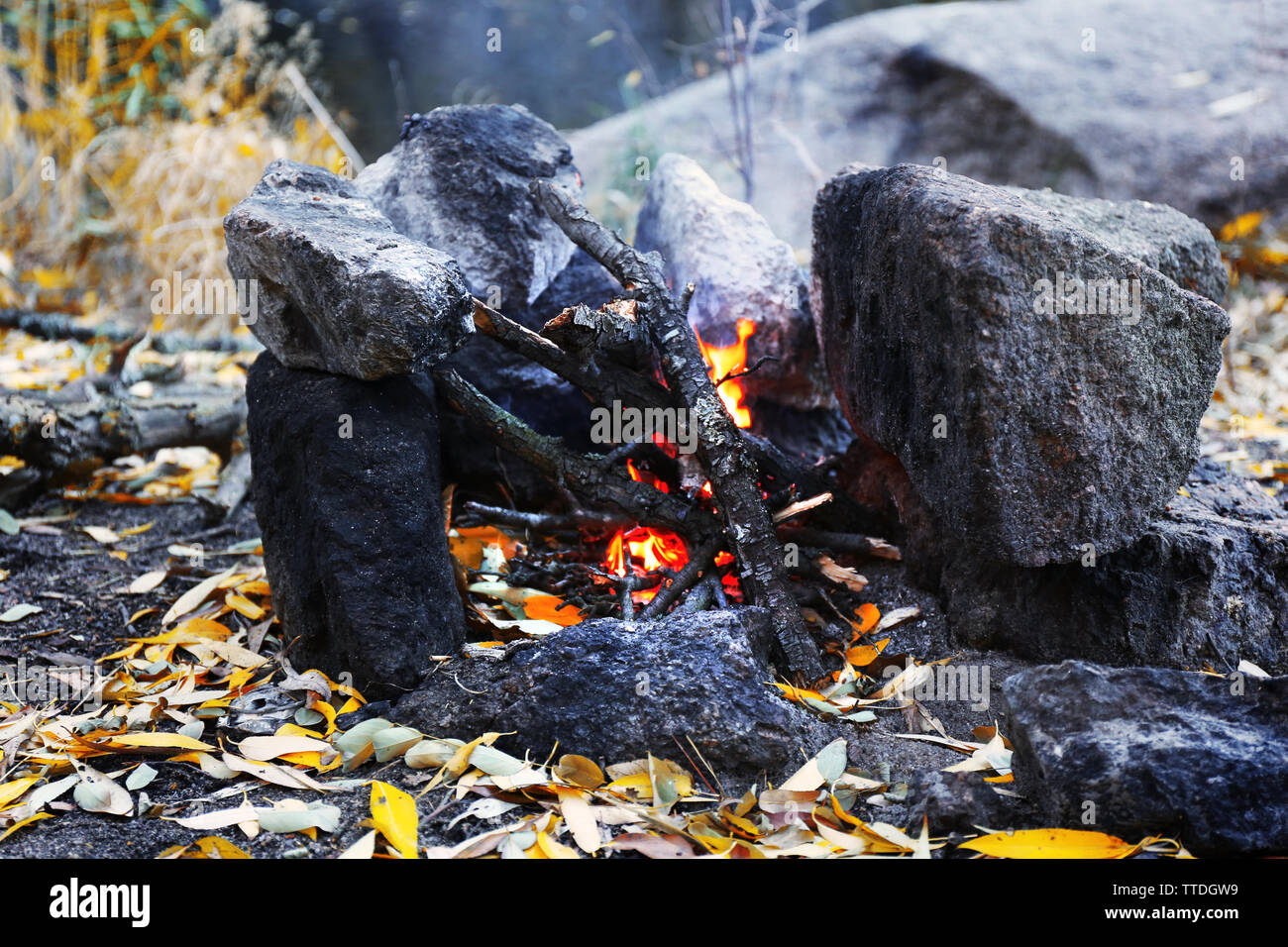 Man making fire with stone hi-res stock photography and images - Alamy