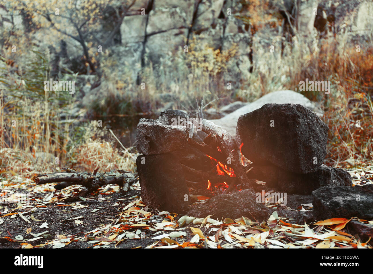 Man making fire with stone hi-res stock photography and images - Alamy