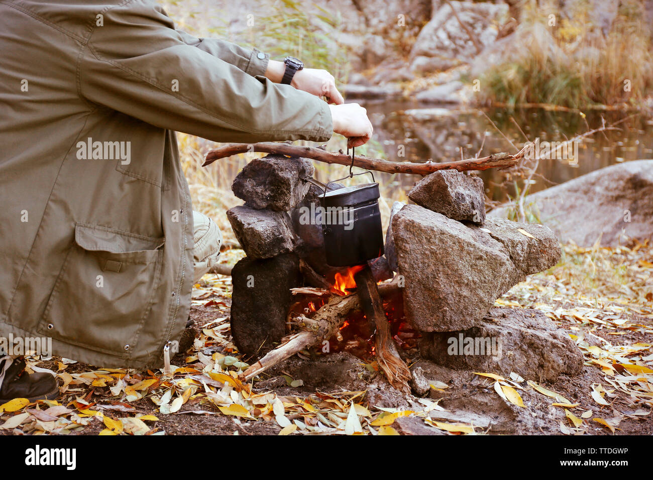 Person making bonfire hi-res stock photography and images - Alamy