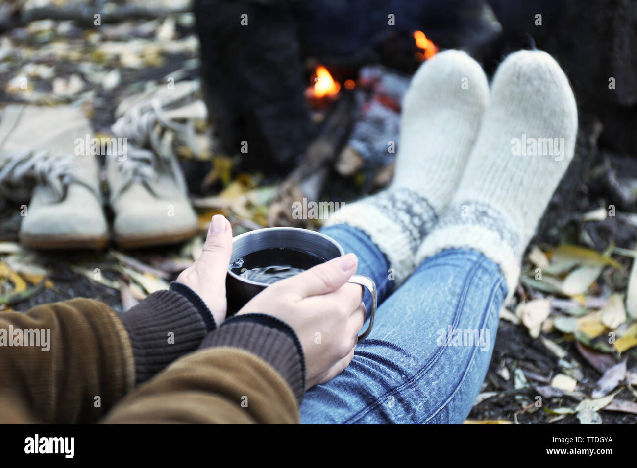 Sitting beside a fire hi-res stock photography and images - Alamy