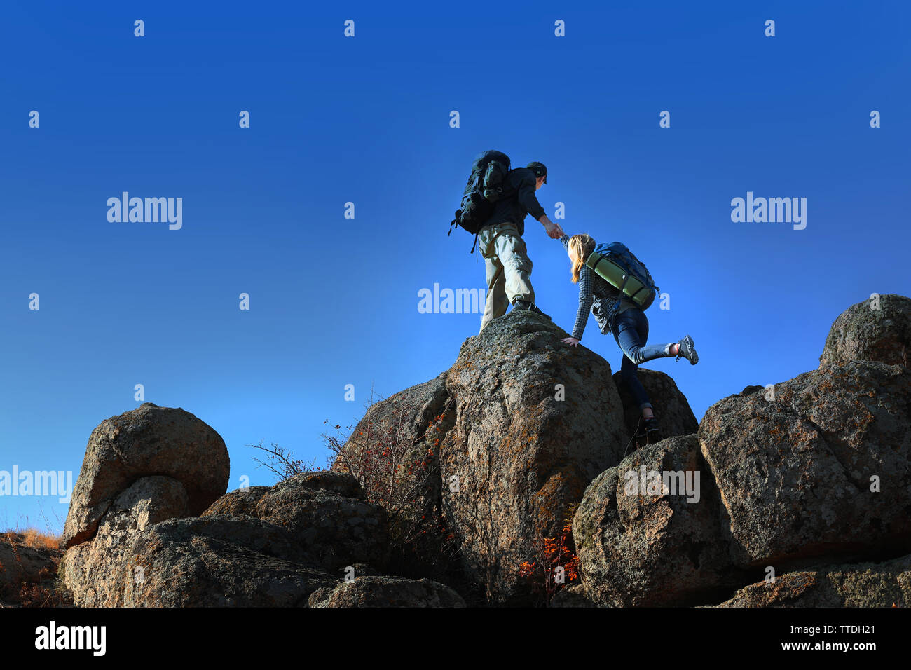 Male mountain guide female hi-res stock photography and images - Alamy