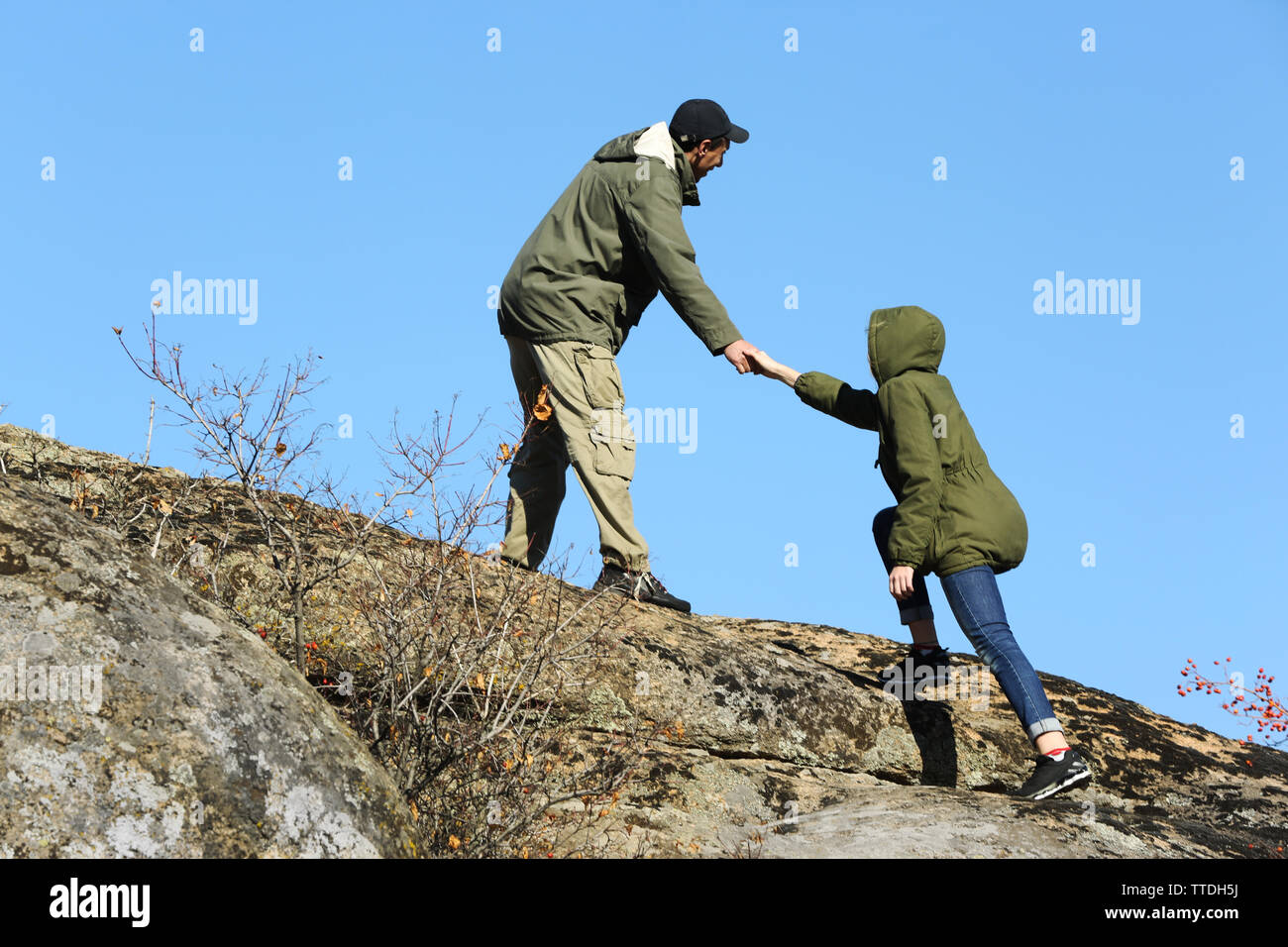 Male mountain guide climbing hi-res stock photography and images - Alamy