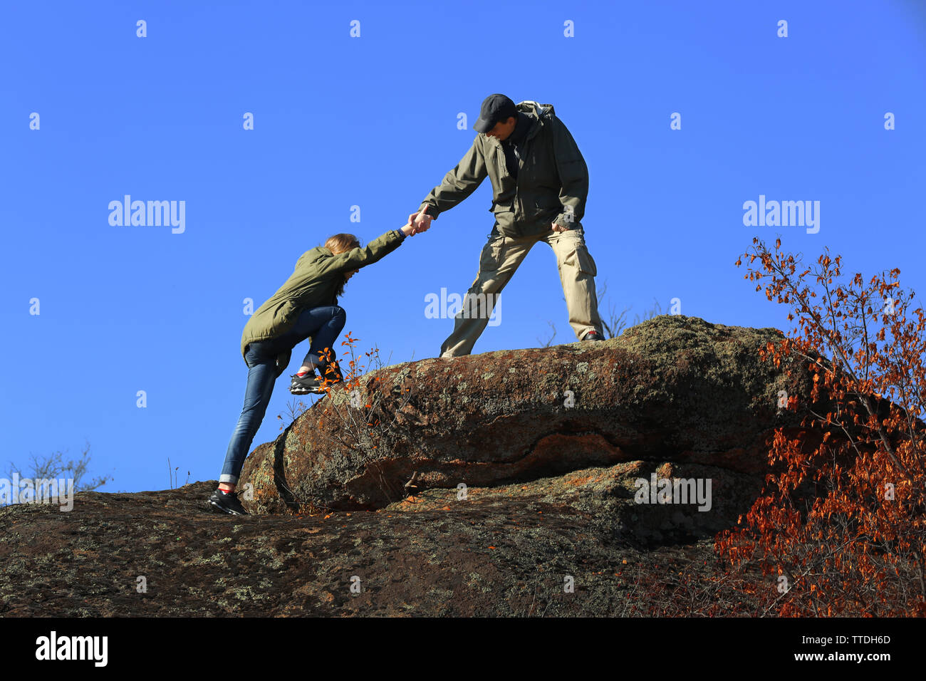 Male mountain guide climbing hi-res stock photography and images - Alamy