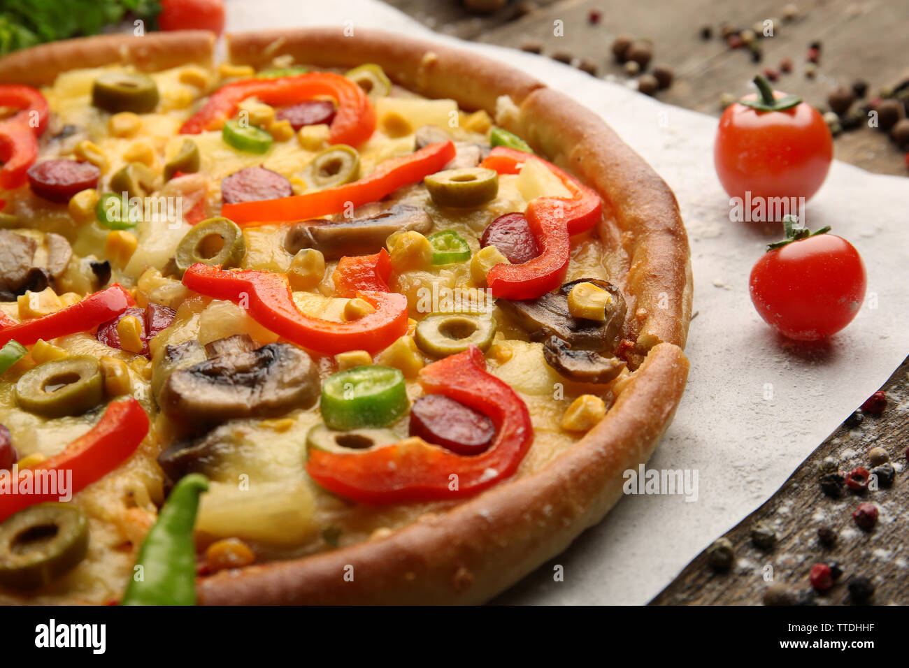 Delicious sliced pizza with vegetables, close-up Stock Photo - Alamy