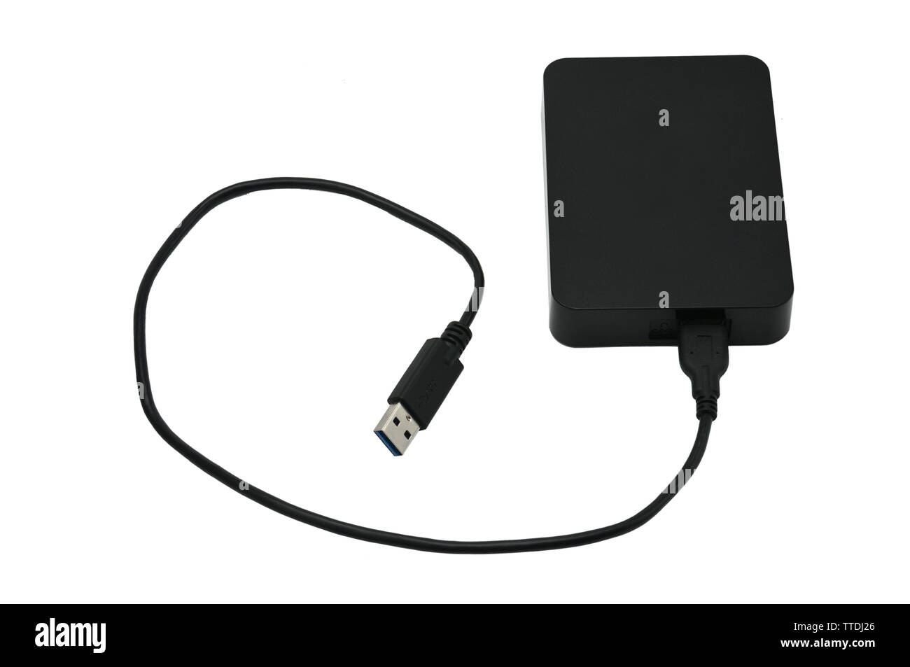 Portable hard drive for backing up various files on an isolated white ...