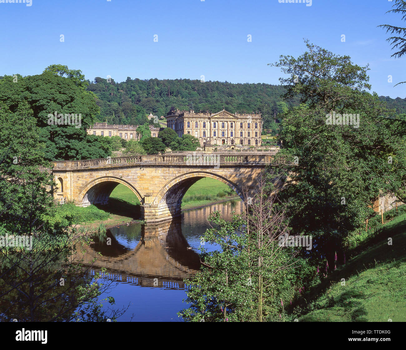 16th century Chatsworth House across River Derwent, Edensor, Derbyshire ...