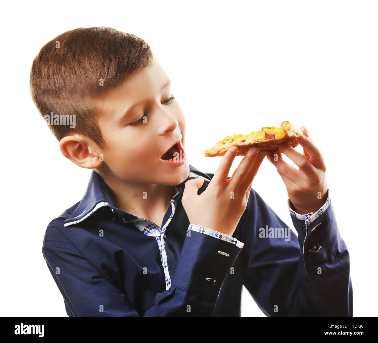 Little boy eating pizza isolated on white Stock Photo - Alamy