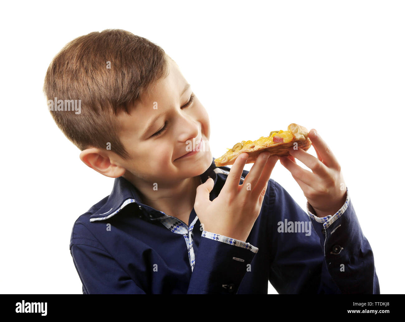 Little boy eating pizza isolated on white Stock Photo - Alamy