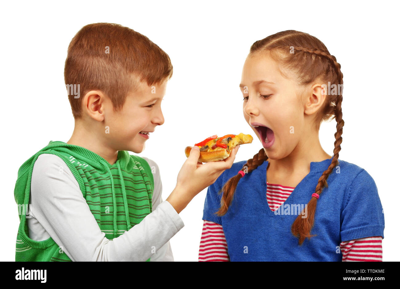 Children eating pizza isolated on white Stock Photo - Alamy