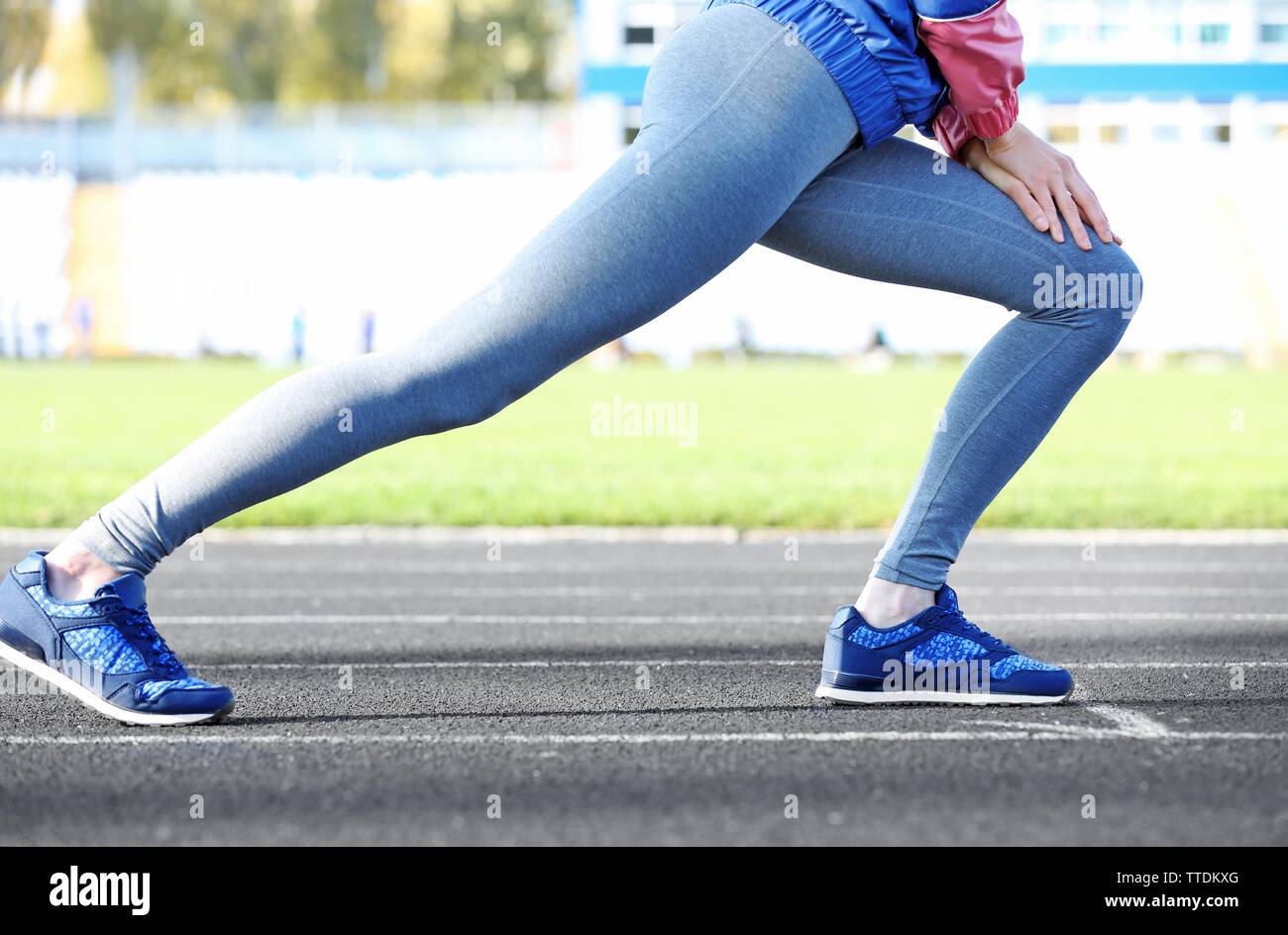 Sports woman legs in running movement Stock Photo - Alamy