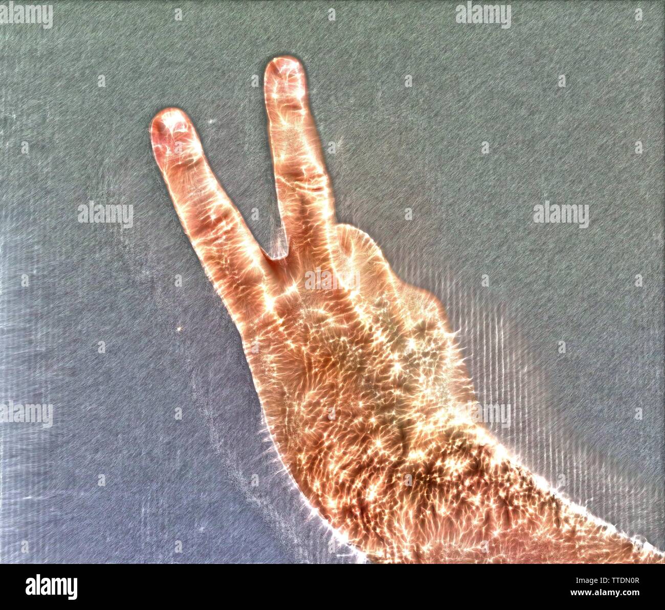 Kirlian aura photography of a glowing human male hand showing different ...