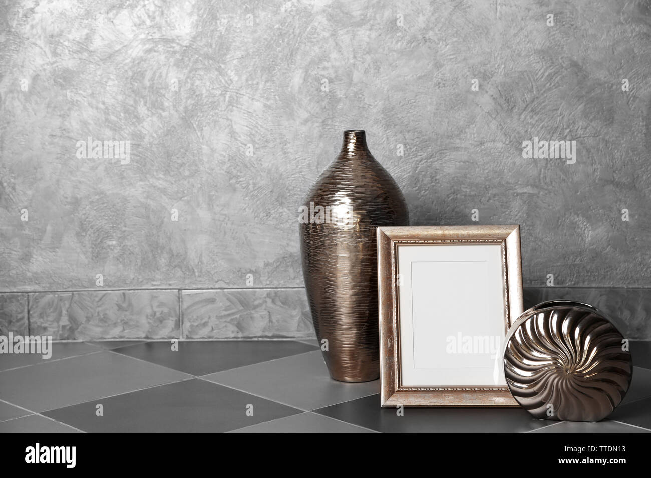 Home decor on grey wall background Stock Photo - Alamy