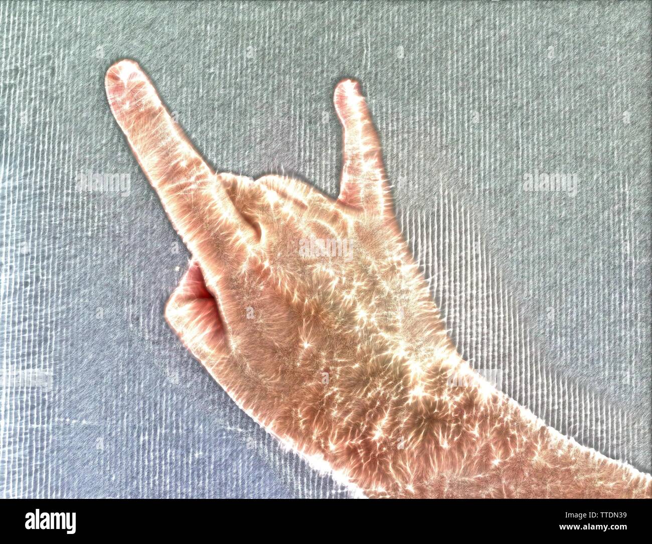 Kirlian aura photography of a glowing human male hand showing different ...