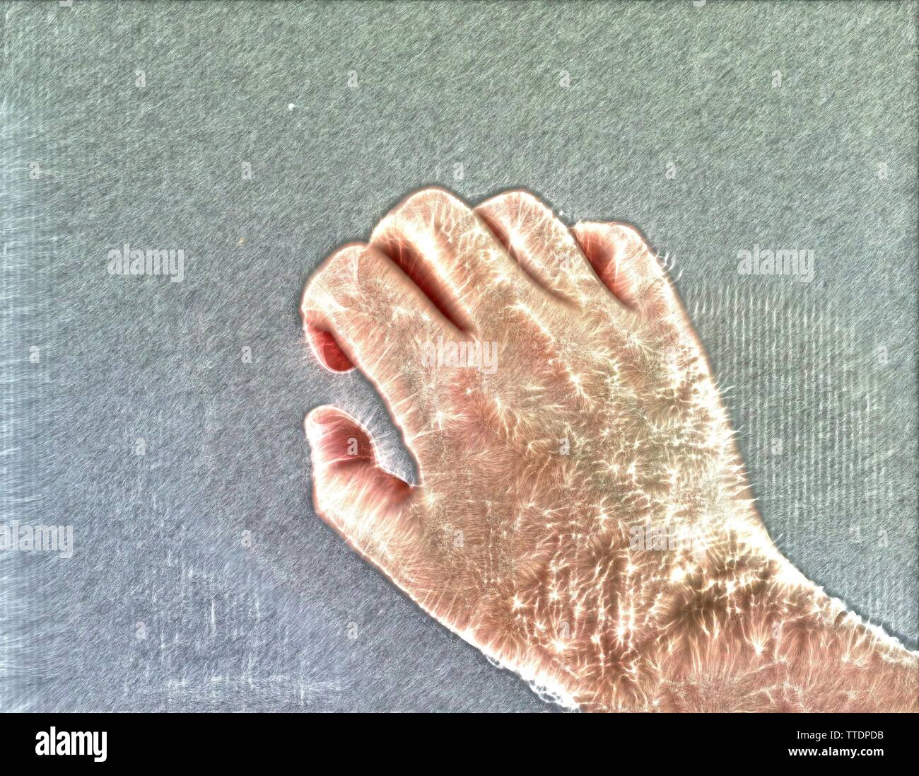 Kirlian aura photography of a glowing human male hand showing different ...