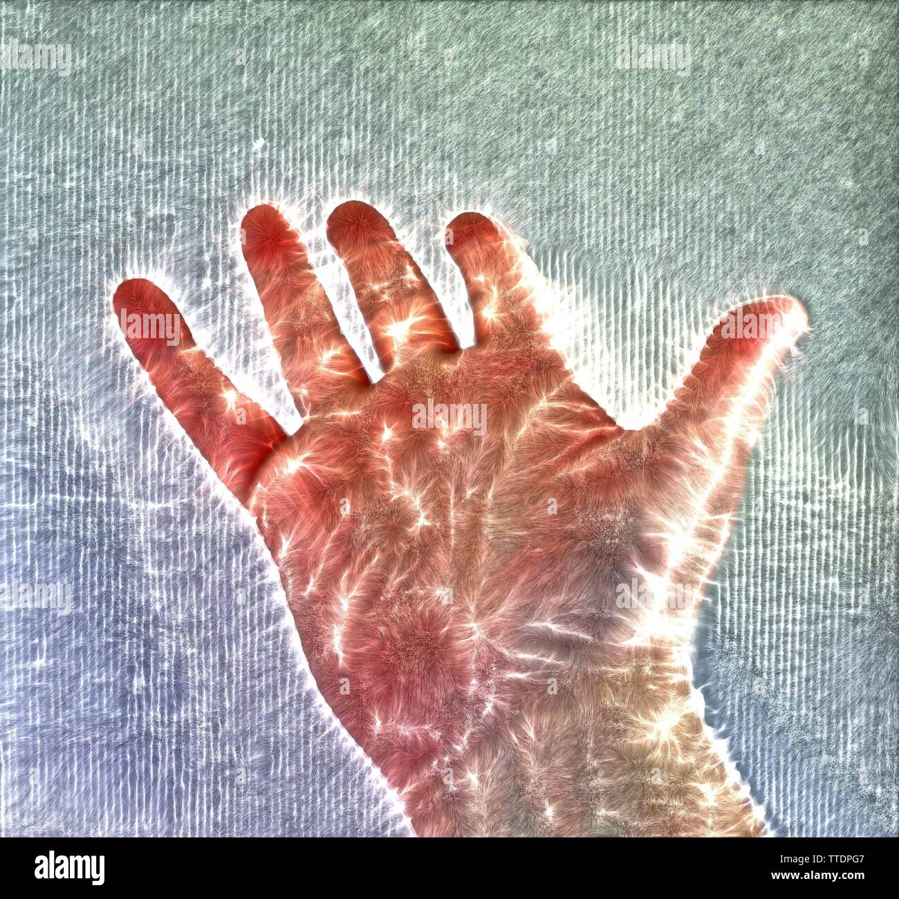 Kirlian aura photography of a glowing human male hand showing different ...