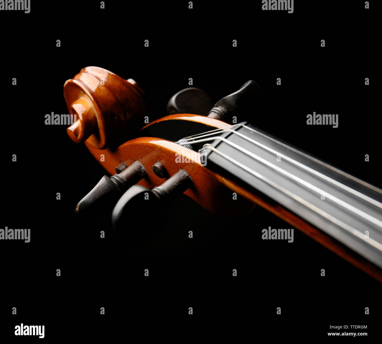 Violin neck on dark background Stock Photo - Alamy