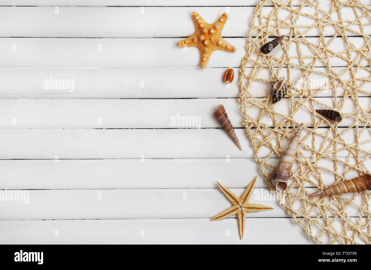 Starfish fishing net seashells hi-res stock photography and images - Alamy
