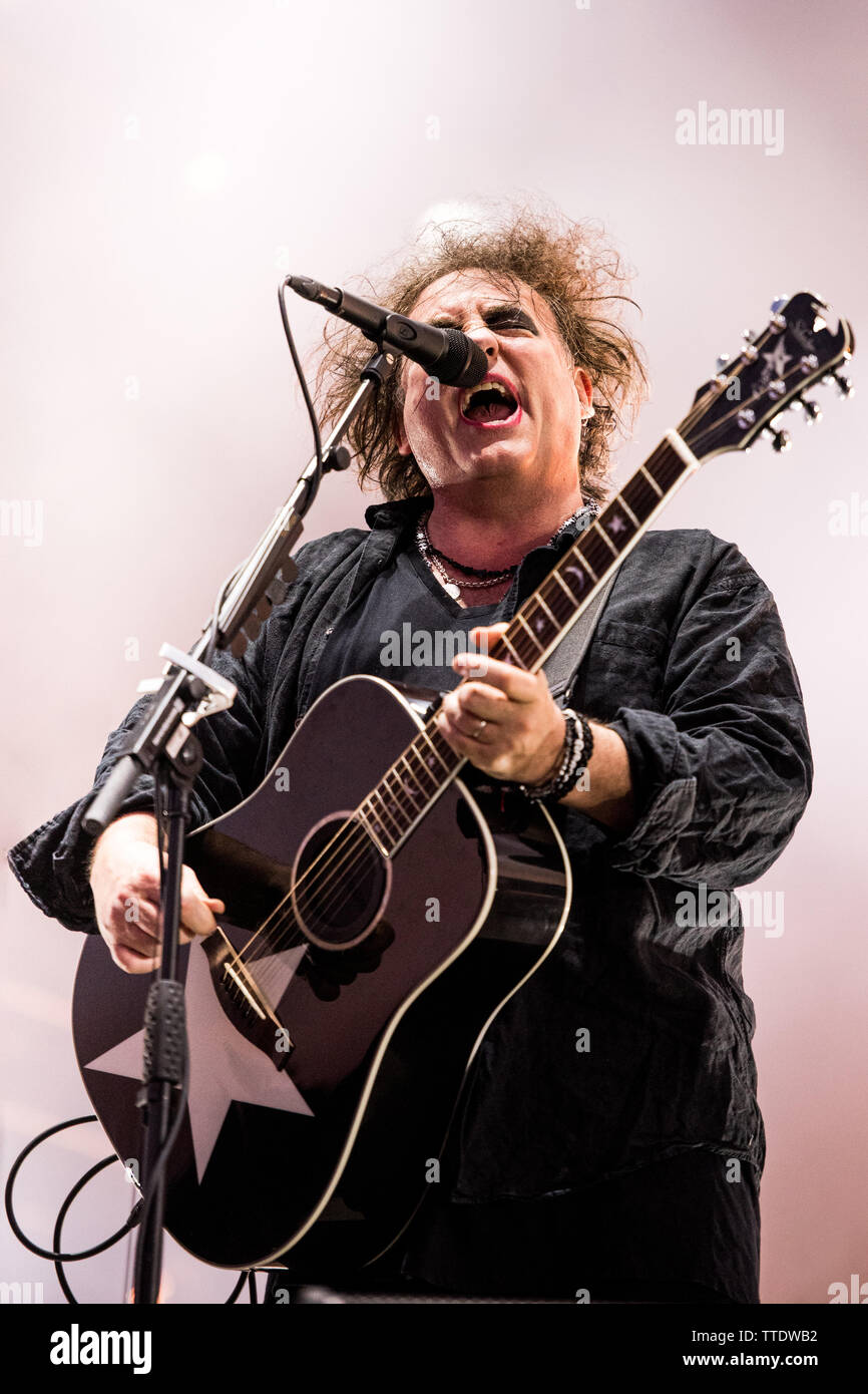 Robert Smith, singer of the English post-punk band The Cure, performing ...