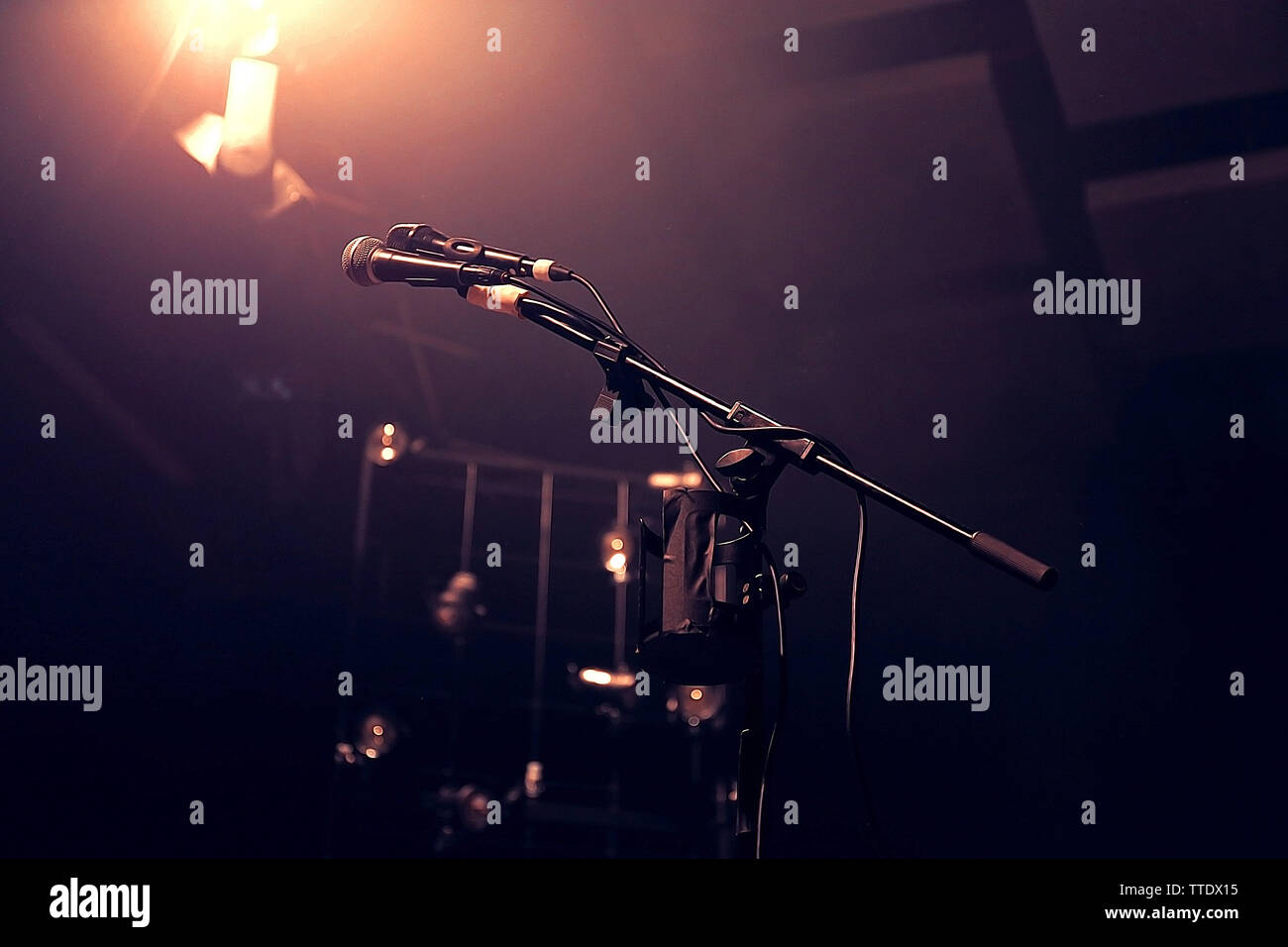 Microphone on prepared concert stage Stock Photo - Alamy