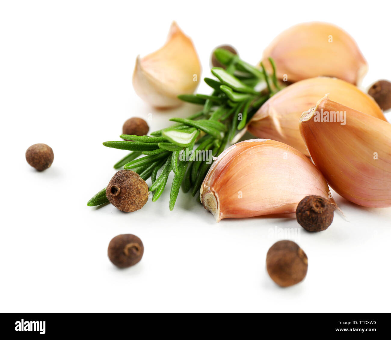Garlic with spices isolated on white Stock Photo - Alamy