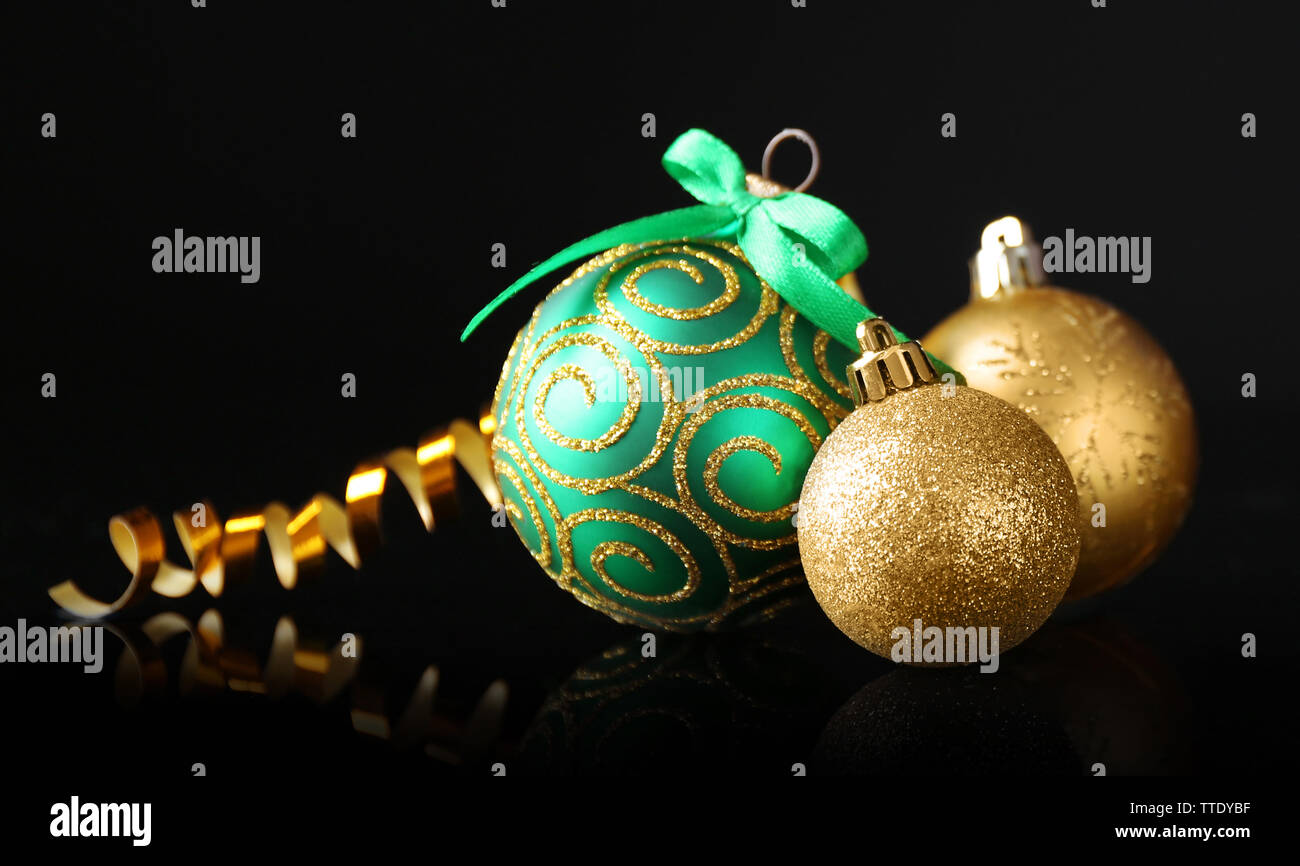 Beautiful Christmas balls on black background Stock Photo - Alamy