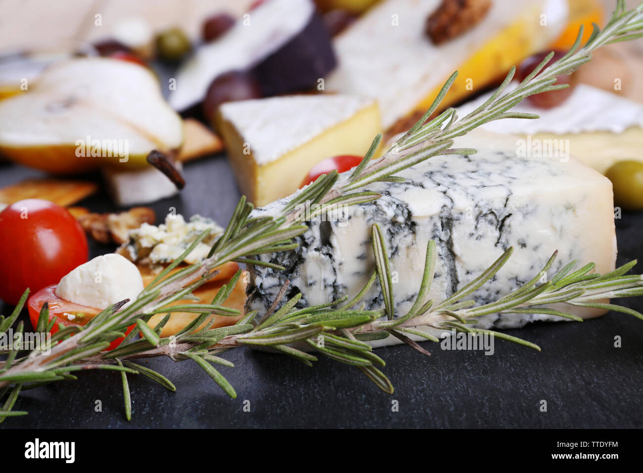 Different kinds of cheese closeup Stock Photo - Alamy