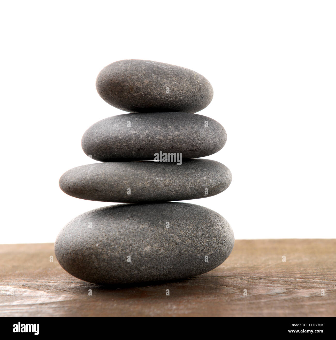 Spa stones, isolated on white Stock Photo - Alamy