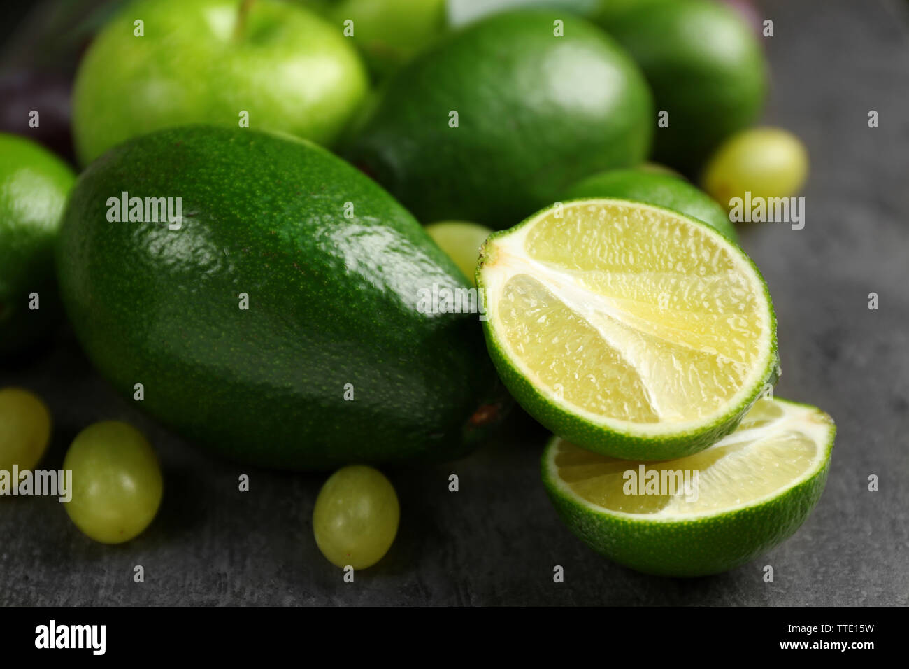 Fruits on dark grey background Stock Photo - Alamy