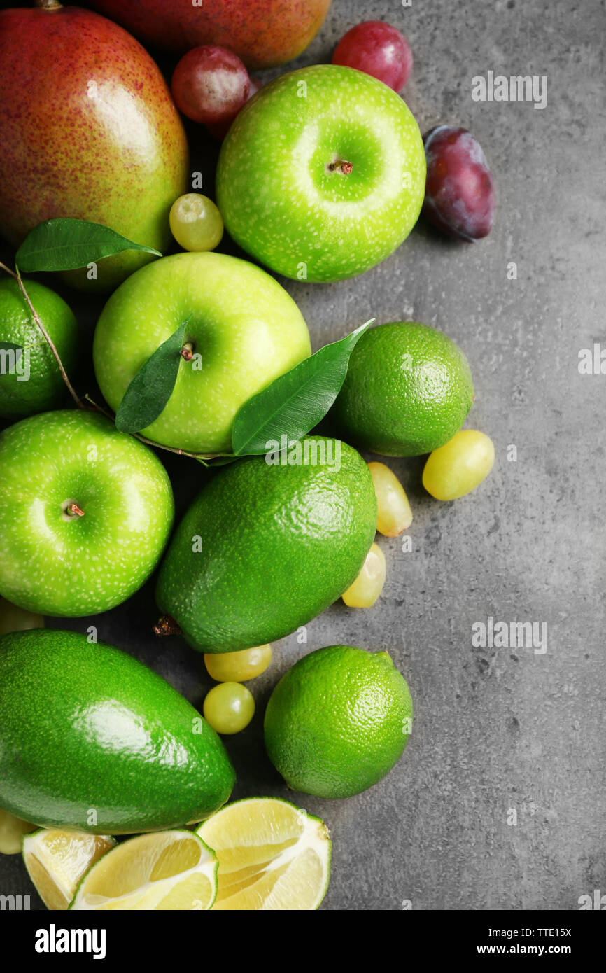 Fruits on dark grey background Stock Photo - Alamy