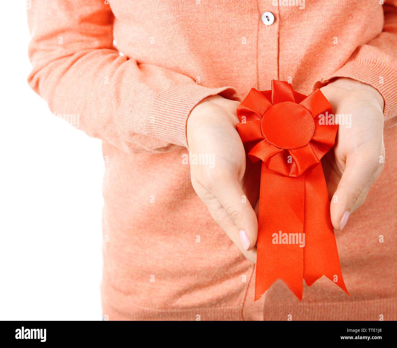 Woman with award ribbon, close-up, isolated on white Stock Photo - Alamy