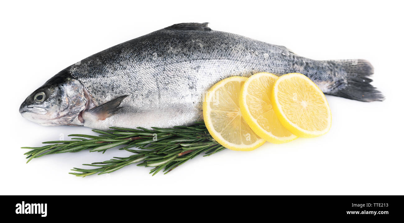 Fresh sea fish with lemon and rosemary isolated on white background ...