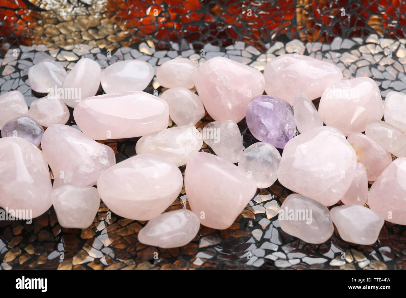 Beautiful mineral stones on glass surface Stock Photo - Alamy
