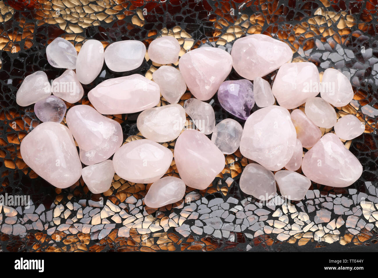 Beautiful mineral stones on glass surface Stock Photo - Alamy