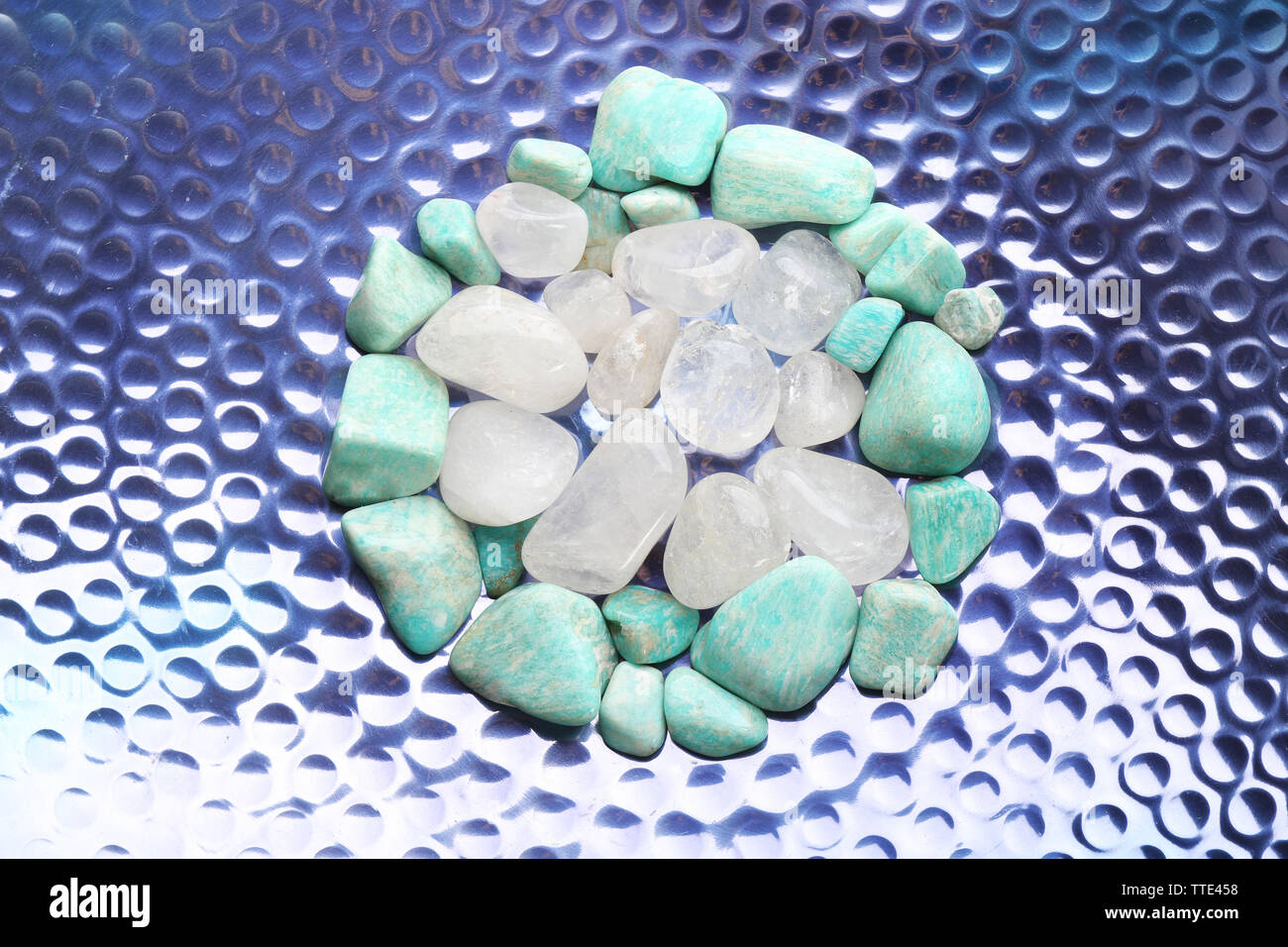 Beautiful mineral stones on bright surface Stock Photo - Alamy