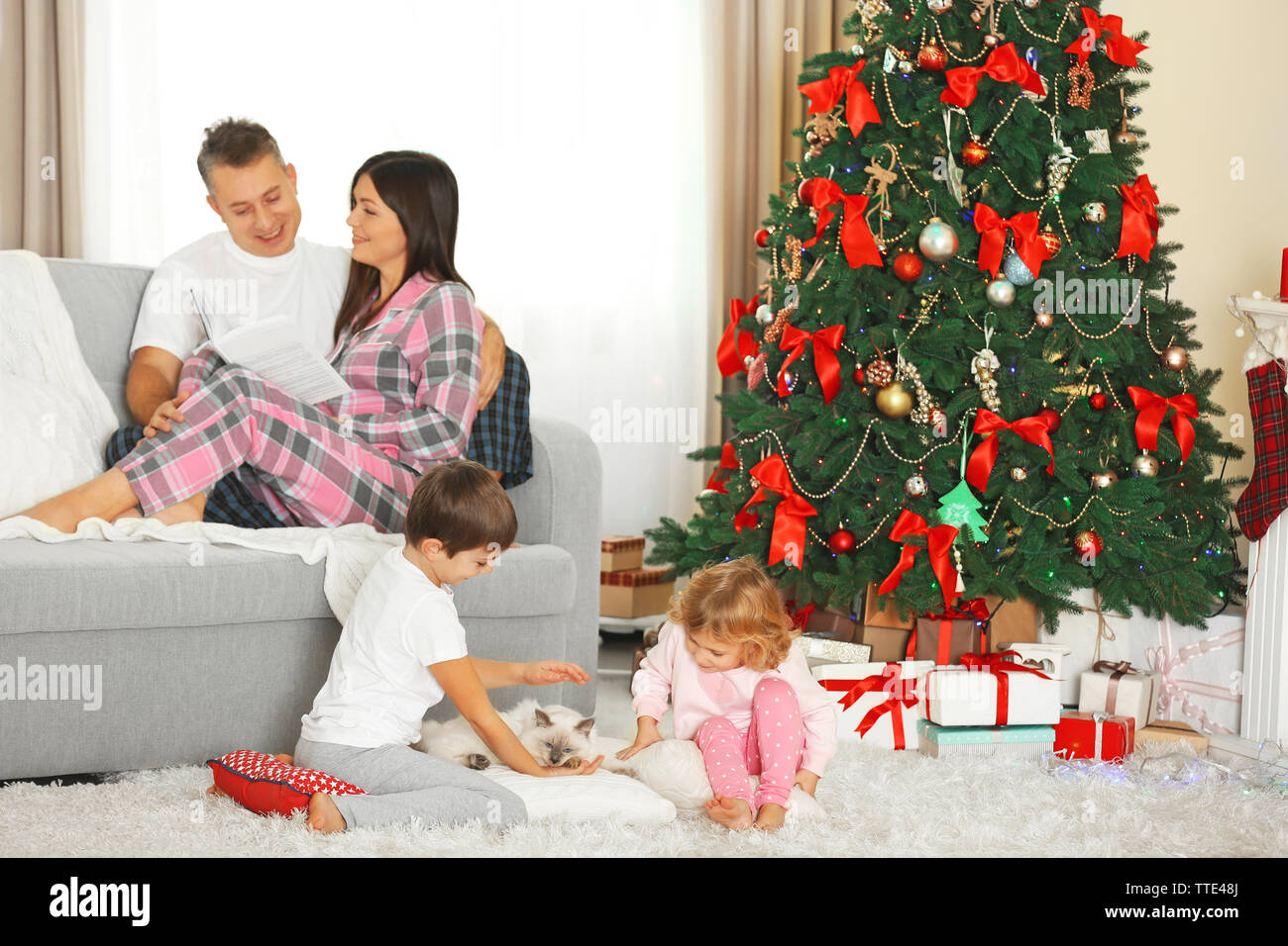 Christmas family portrait in home holiday living room, at morning Stock ...