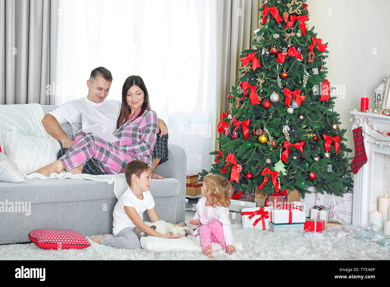 Christmas family portrait in home holiday living room, at morning Stock ...