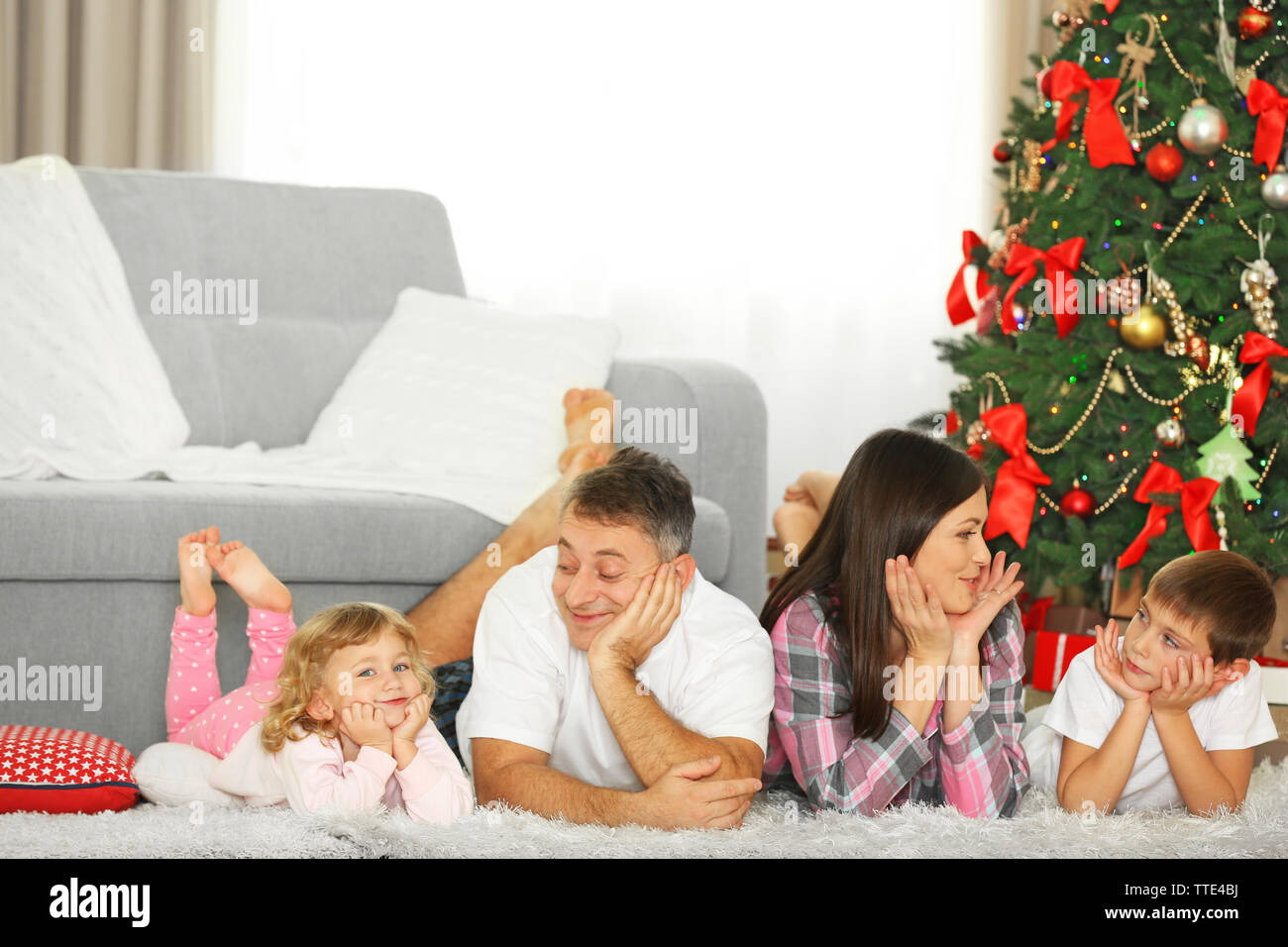 Christmas family portrait in home holiday living room, at morning Stock ...