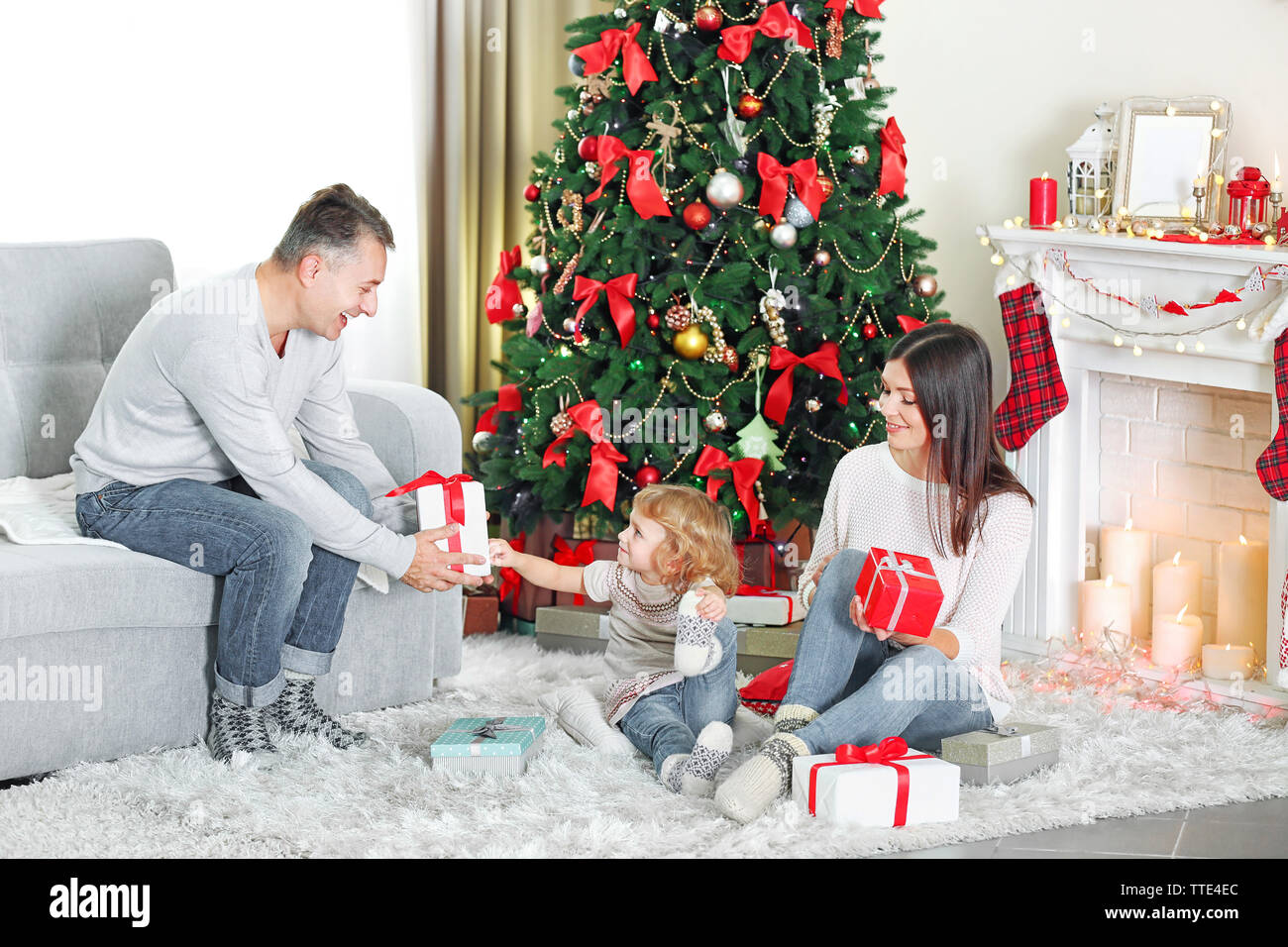 Christmas family portrait in home holiday living room, at morning Stock ...