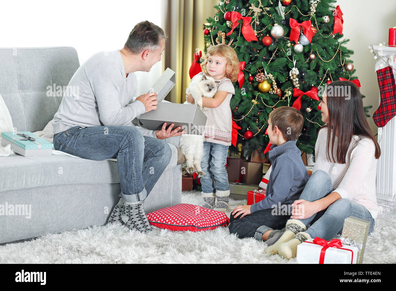 Christmas family portrait in home holiday living room, at morning Stock ...