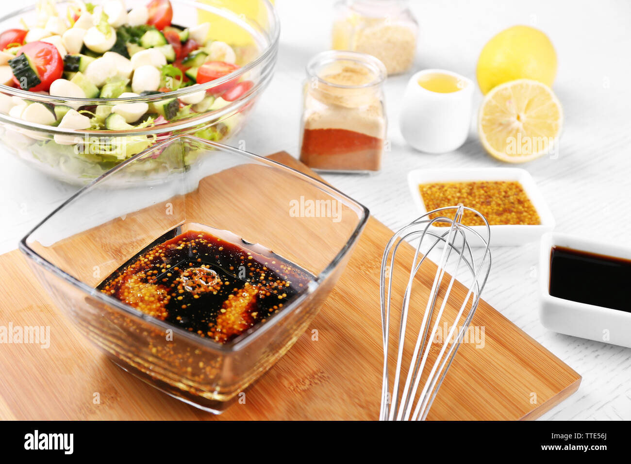 Process of preparing sauce for salad, at kitchen Stock Photo - Alamy