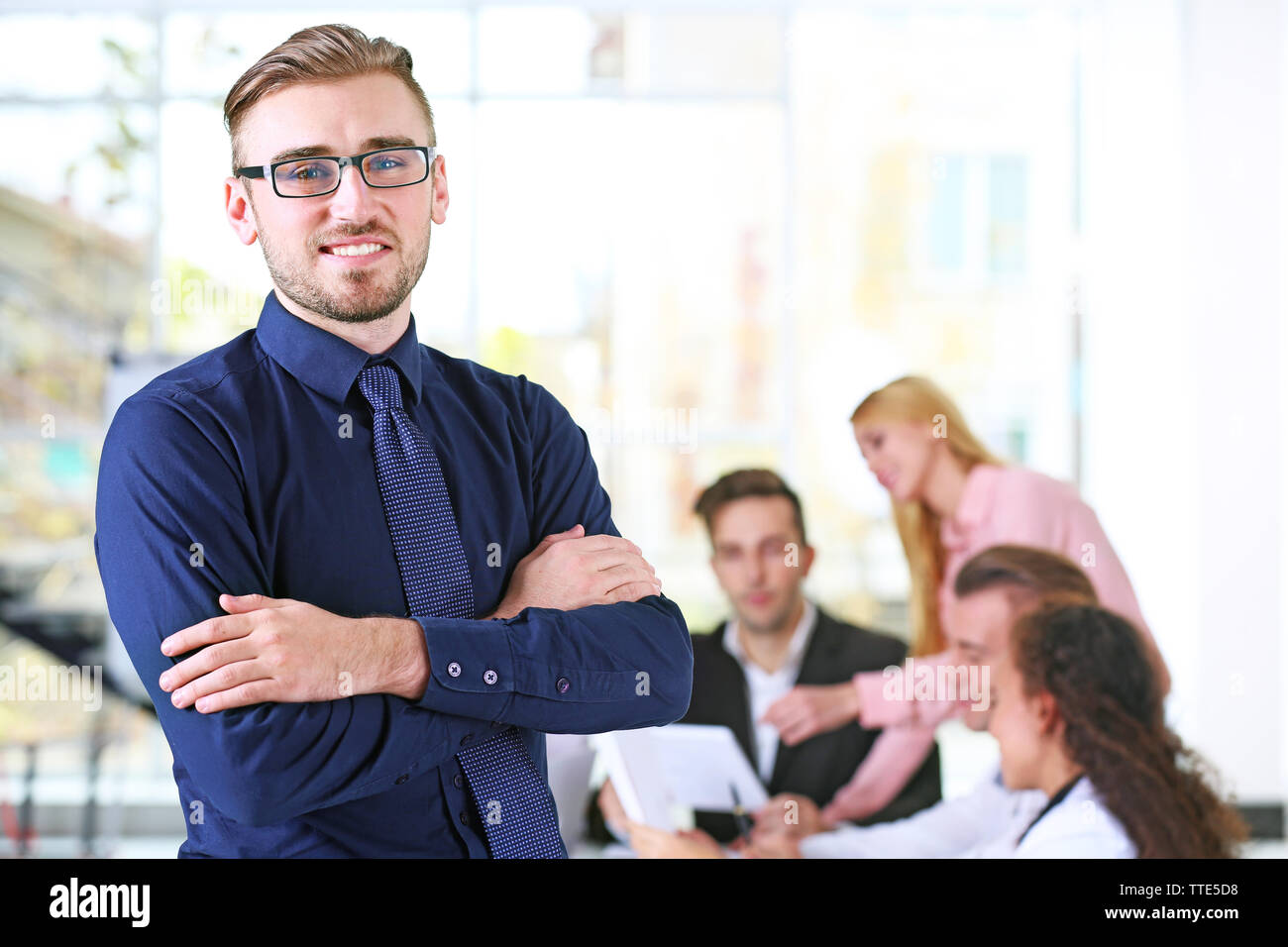 Young business man at the meeting in a conference room Stock Photo - Alamy