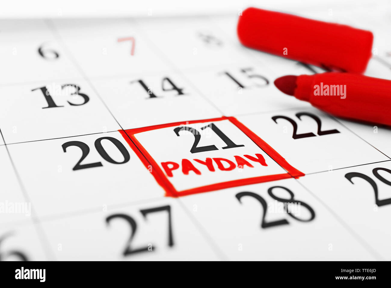 Payday concept. Calendar with red felt pen background. Date in frame ...