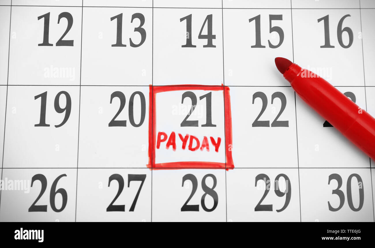 Payday concept. Calendar with red felt pen background. Date in frame ...