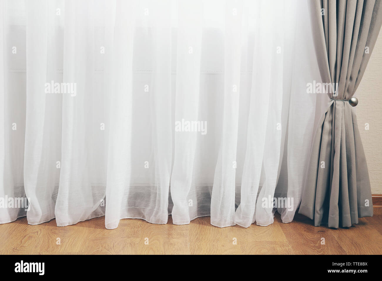 Empty room with curtain and window Stock Photo - Alamy